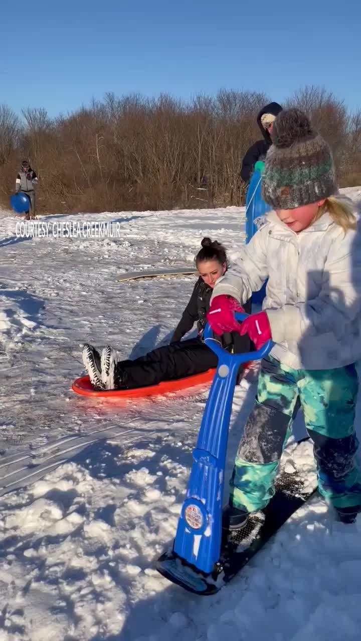 VIDEO NOW: Portsmouth police officer takes break, sleds with local ...